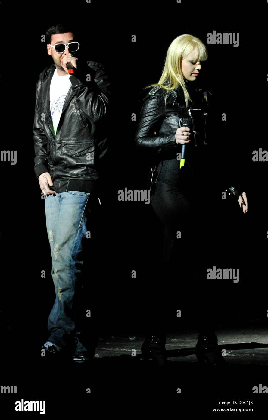 German rapper Sido (L) and a female singer perform during an almost ...