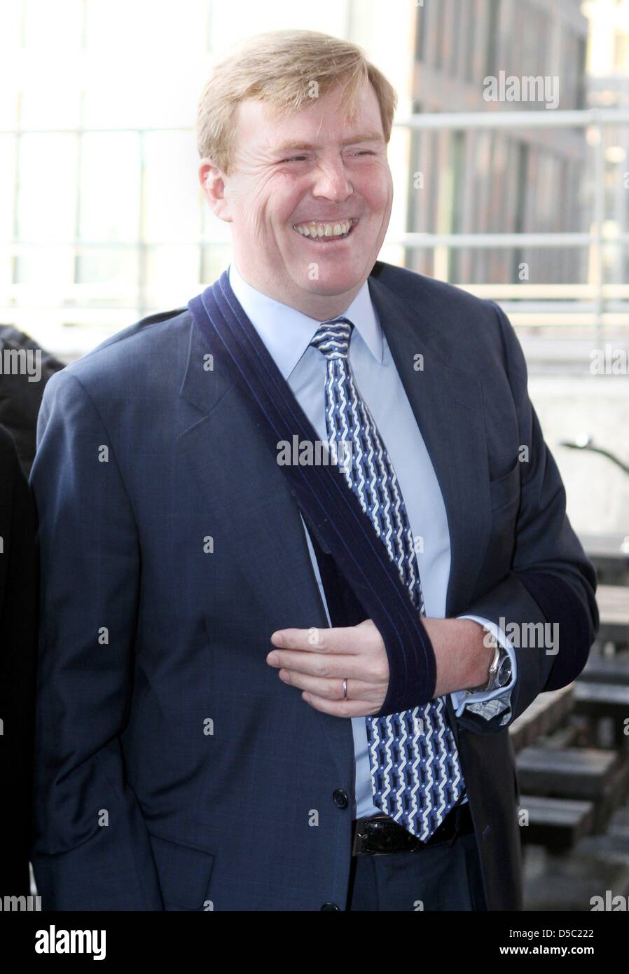 Dutch Crown Prince Willem-Alexander, who wears an arm sling because he ...