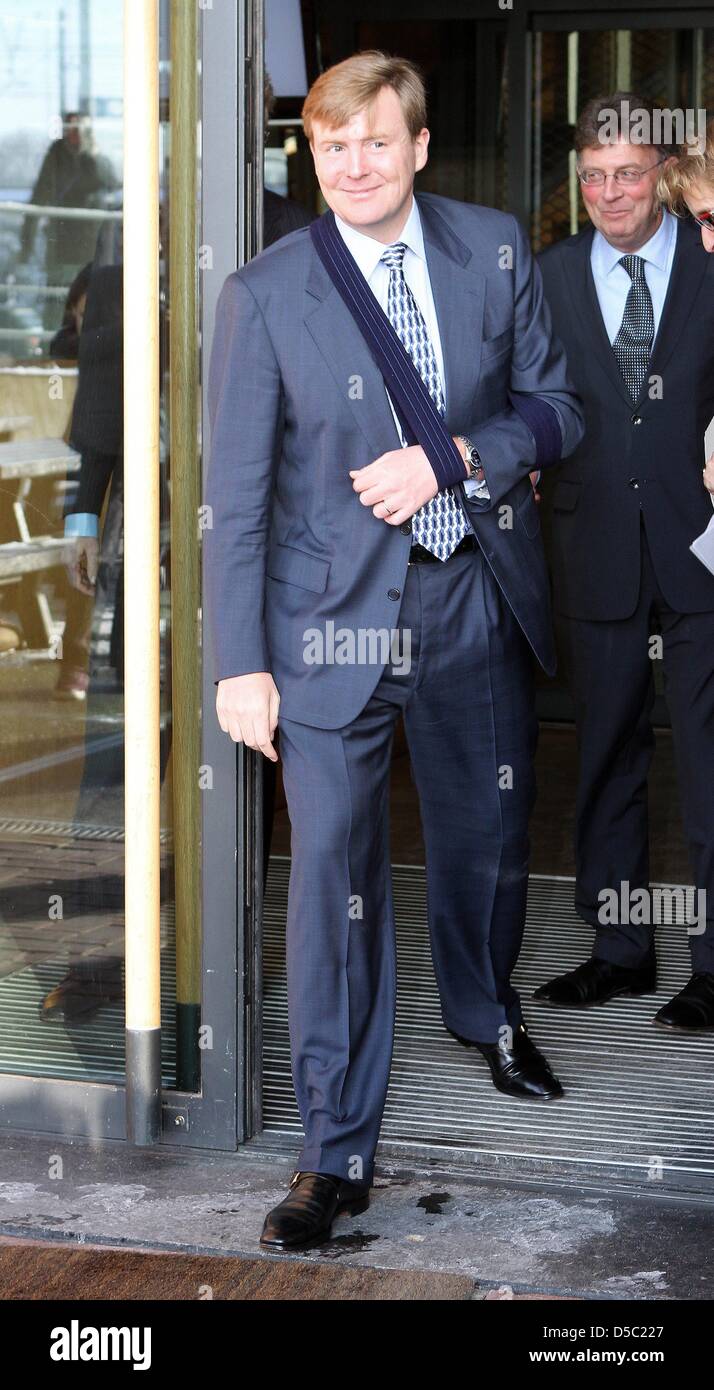 Dutch Crown Prince Willem-Alexander, who wears an arm sling because he ...