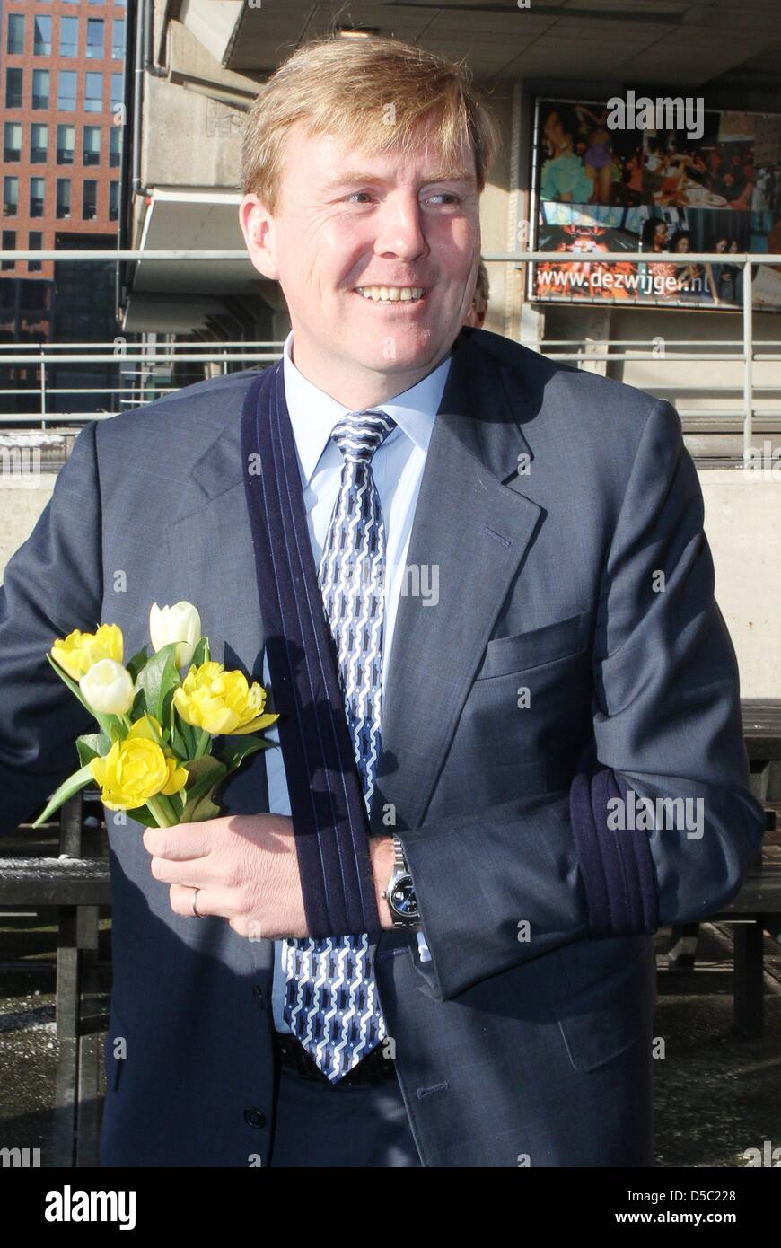 Dutch Crown Prince Willem-Alexander, who wears an arm sling because he ...