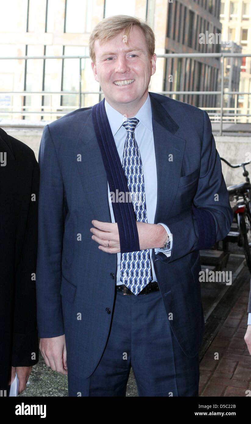 Dutch Crown Prince Willem-Alexander, who wears an arm sling because he ...