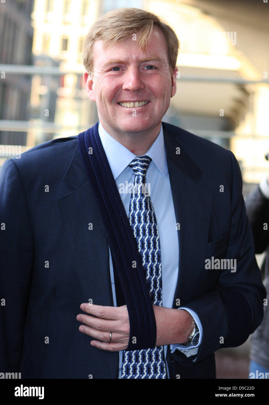 Dutch Crown Prince Willem-Alexander, who wears an arm sling because he ...