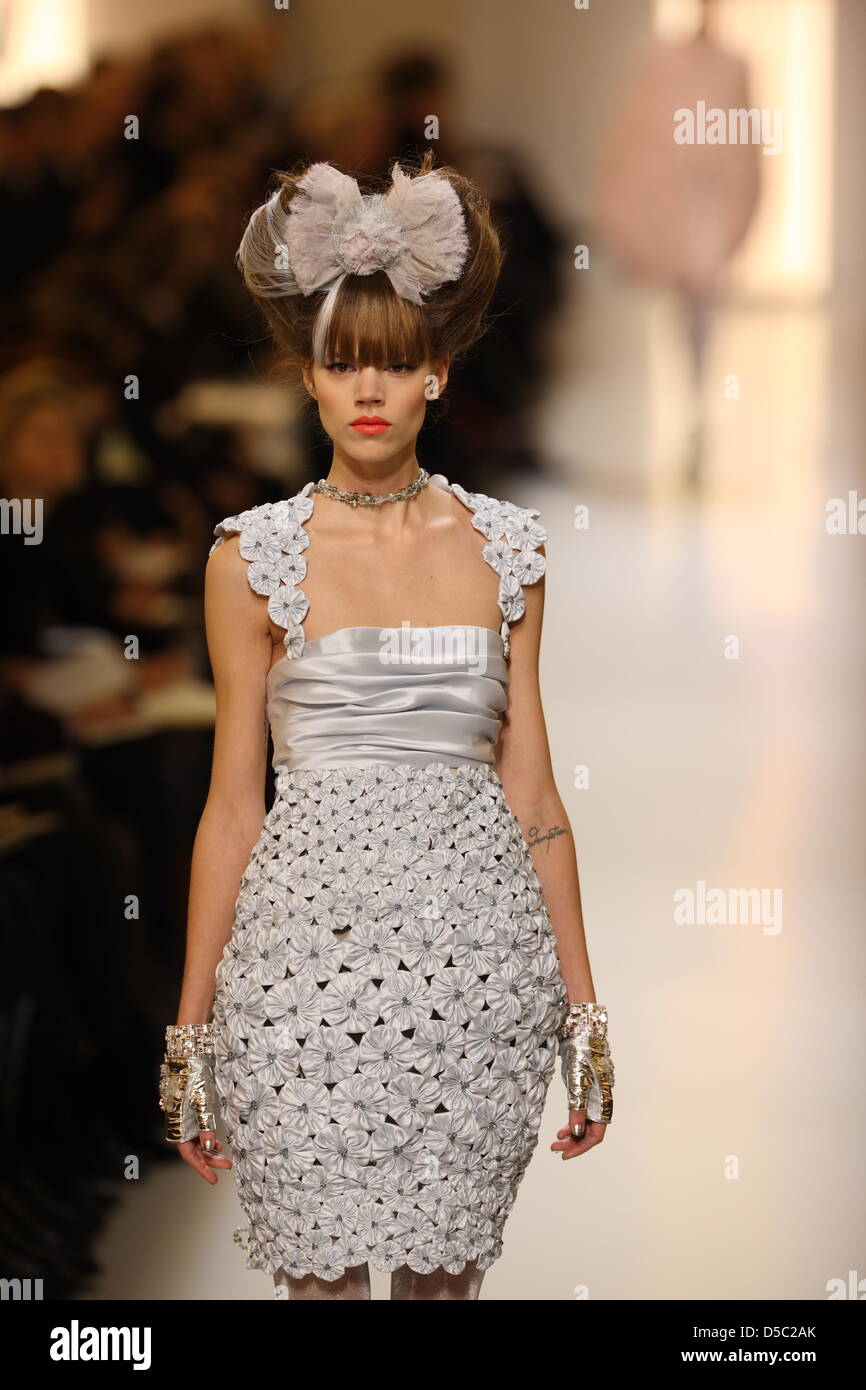 A model wears a creation as part of Chanel's Haute-Couture fashion ...
