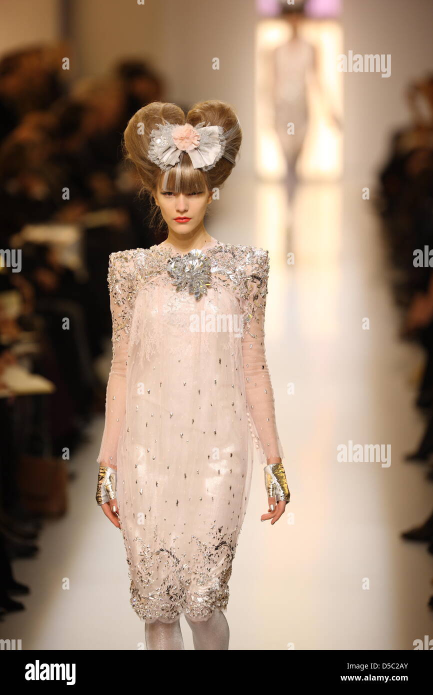 A model wears a creation as part of Chanel's Haute-Couture fashion ...