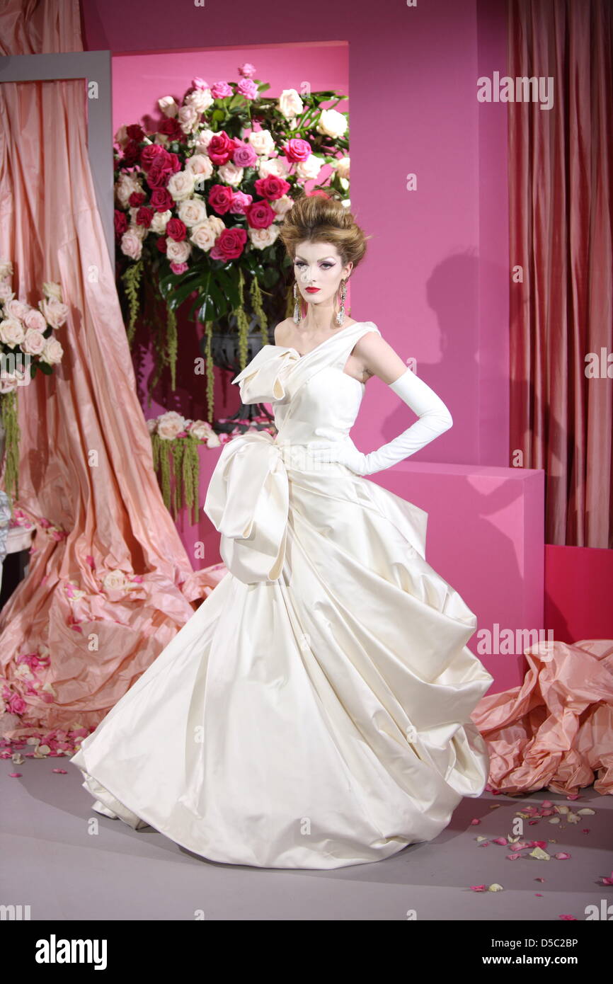 A model wears a creation as part of Christian Dior's Haute Couture ...