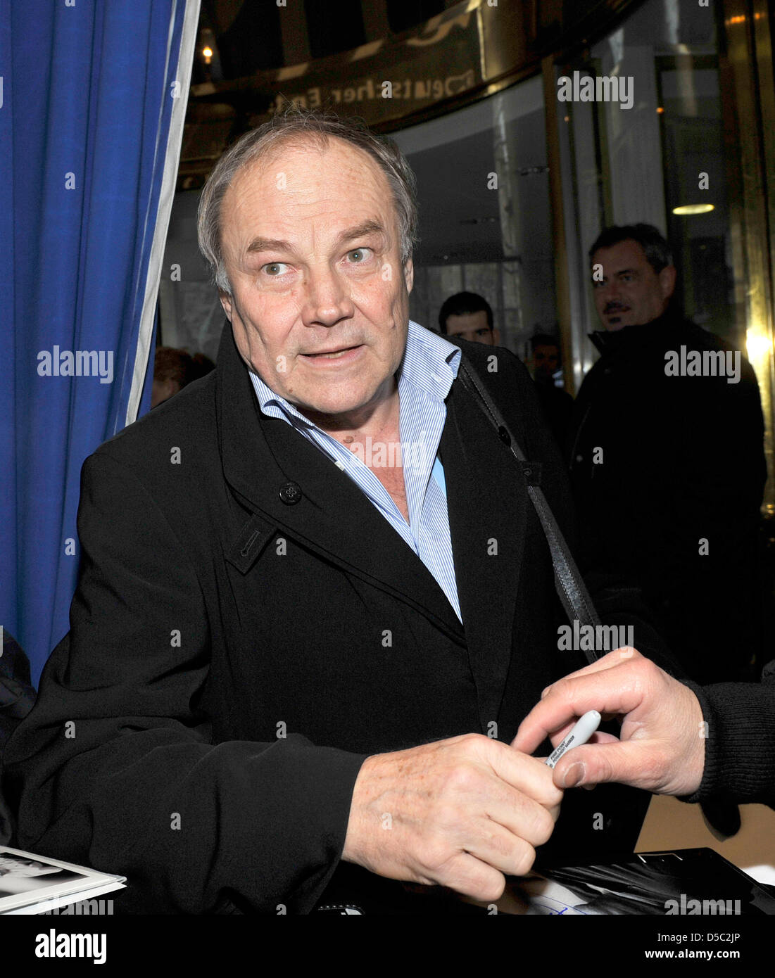 Director and actor Klaus Maria Brandauer signs autographs prior to the ...