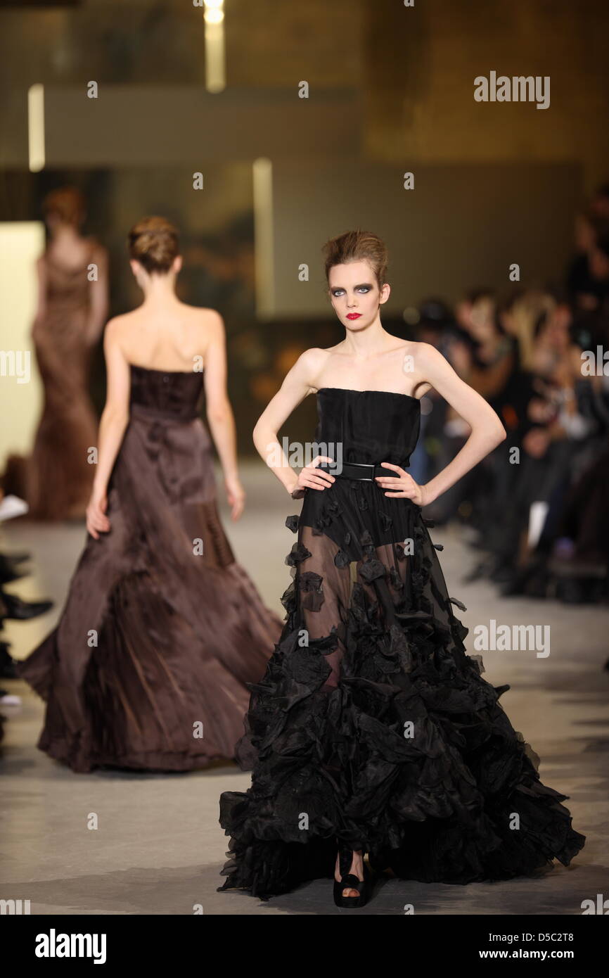 Models present creations of Stephane Rolland's Haute Couture fashion ...