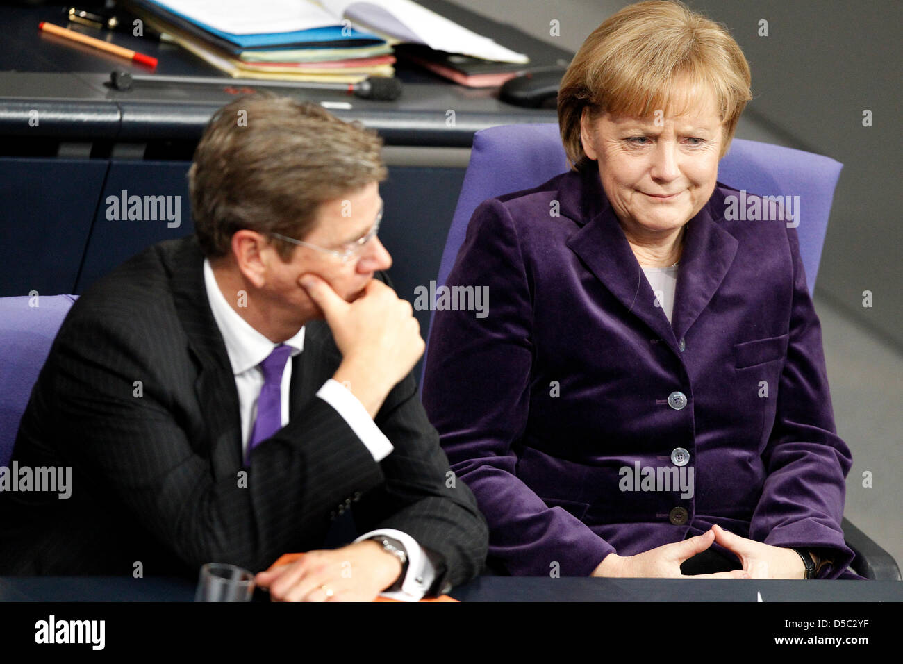 German Chancellor Angela Merkel (R) and Foreign Minister Guido ...