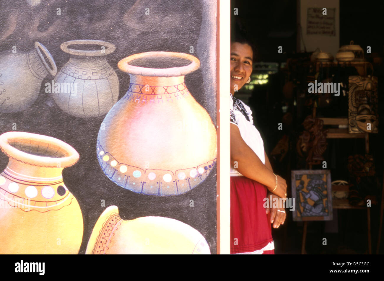 A maya lady stands in the doorway of a gift shop at Belize zoo Stock ...