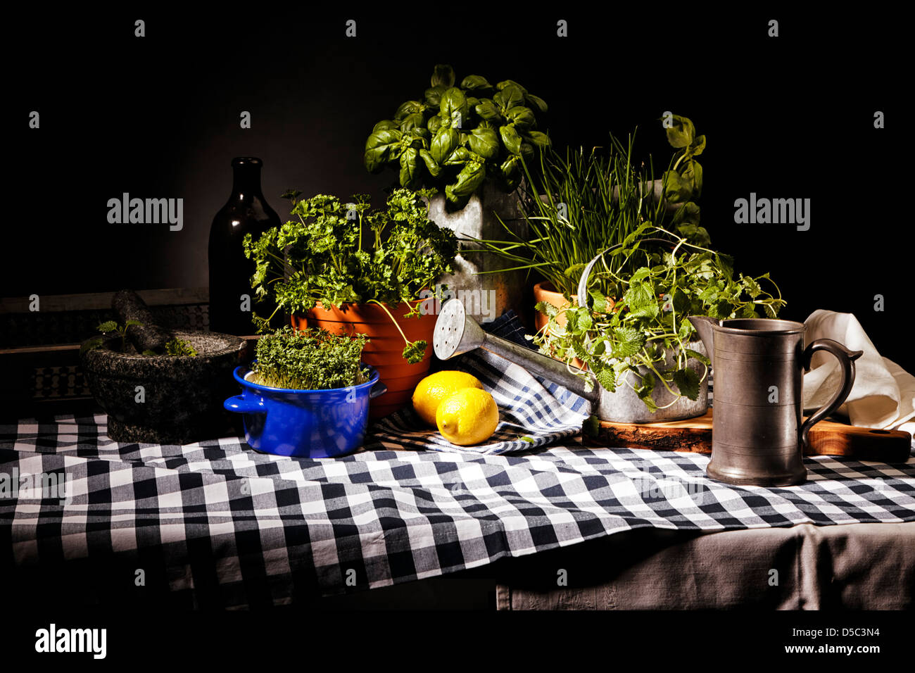 Still life with various herbs and utensils Stock Photo - Alamy