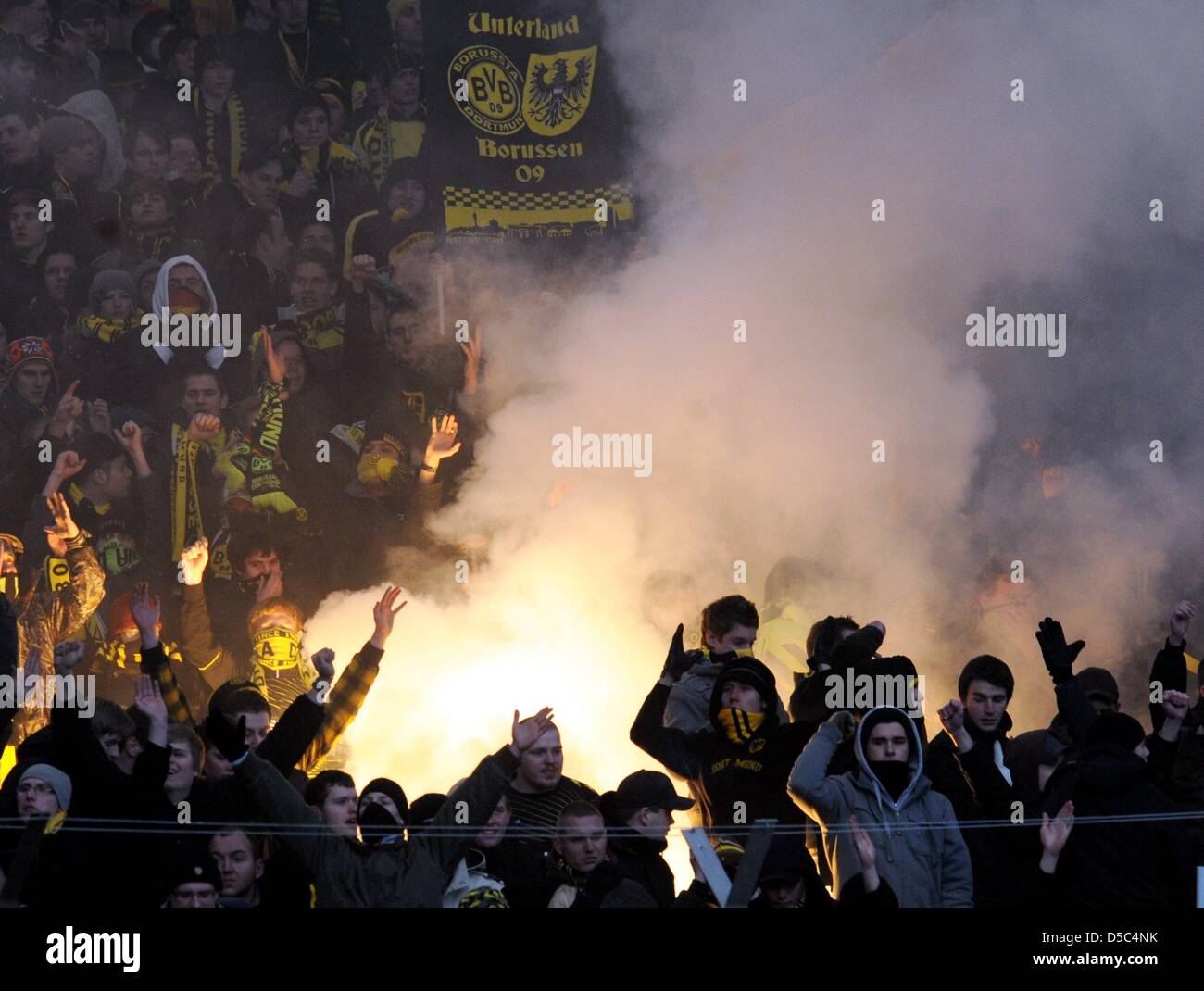 Dortmund's fans have set a fire on the stands during the German ...