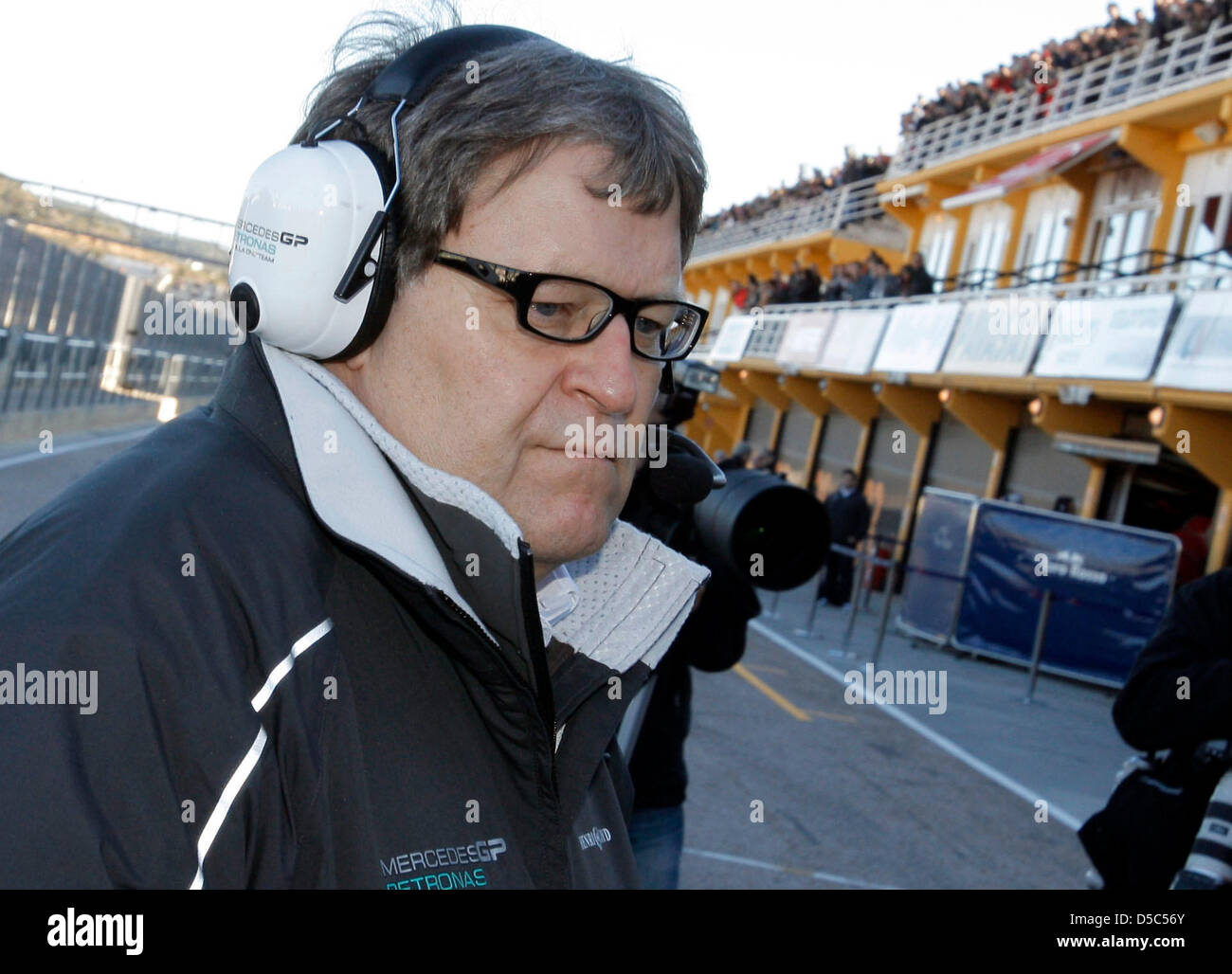 Mercedes Motorports director, German Norbert Haug, walks through the ...