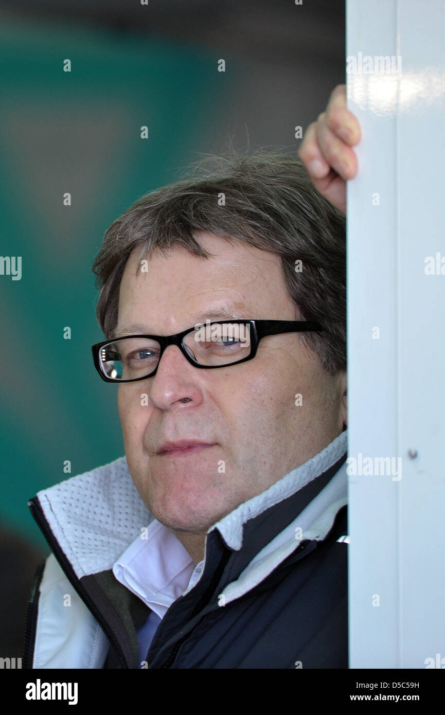 Mercedes Motorports director, German Norbert Haug, walks through the ...