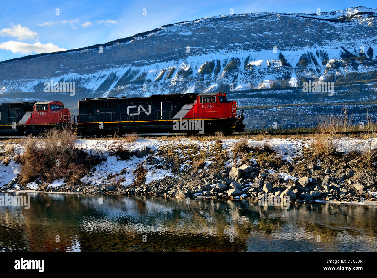 A Canadian National freight train traveling east through the rocky ...