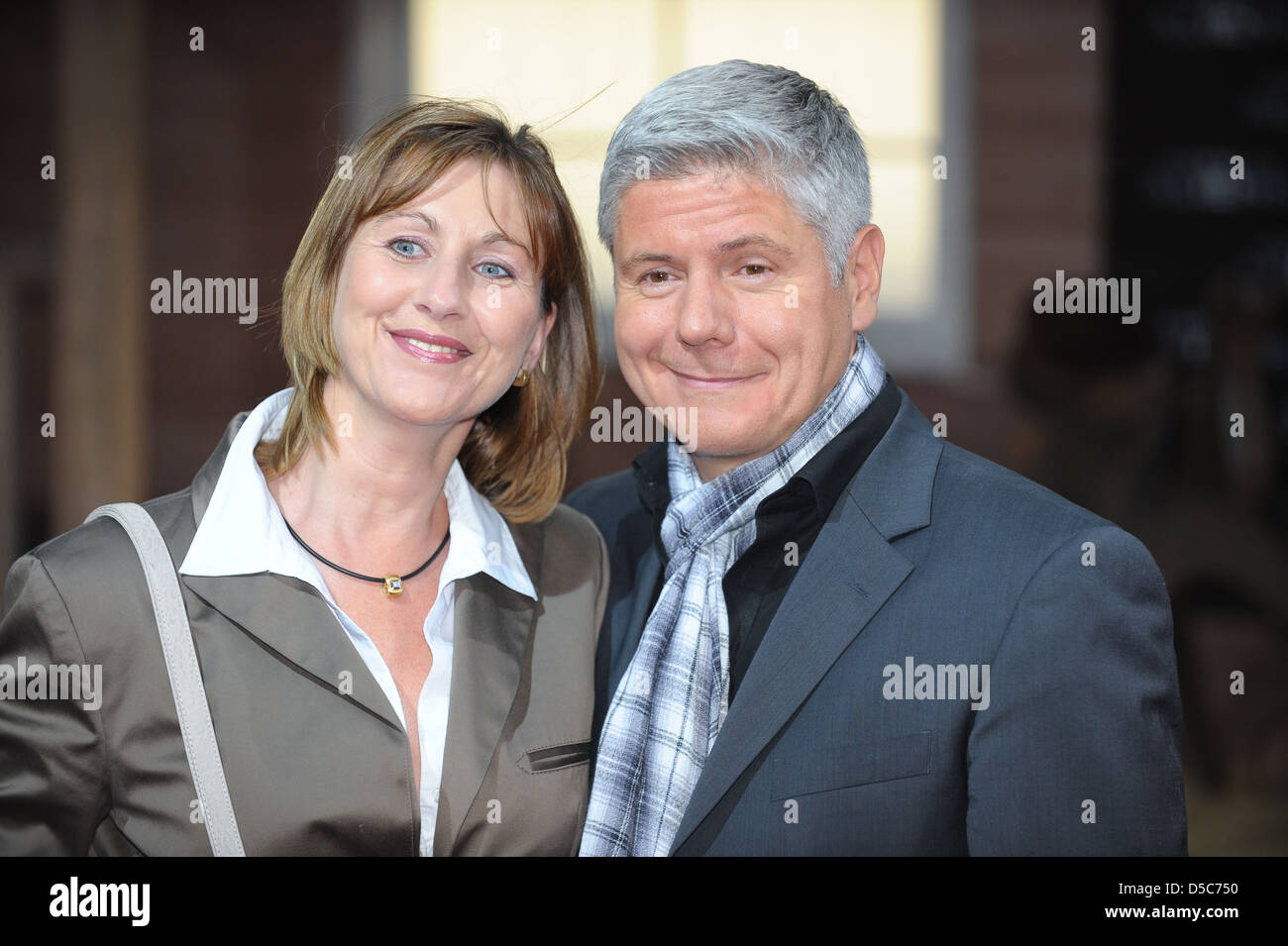 guest and Michael Marx at the premiere of the movie 'Cowboys and Aliens ...