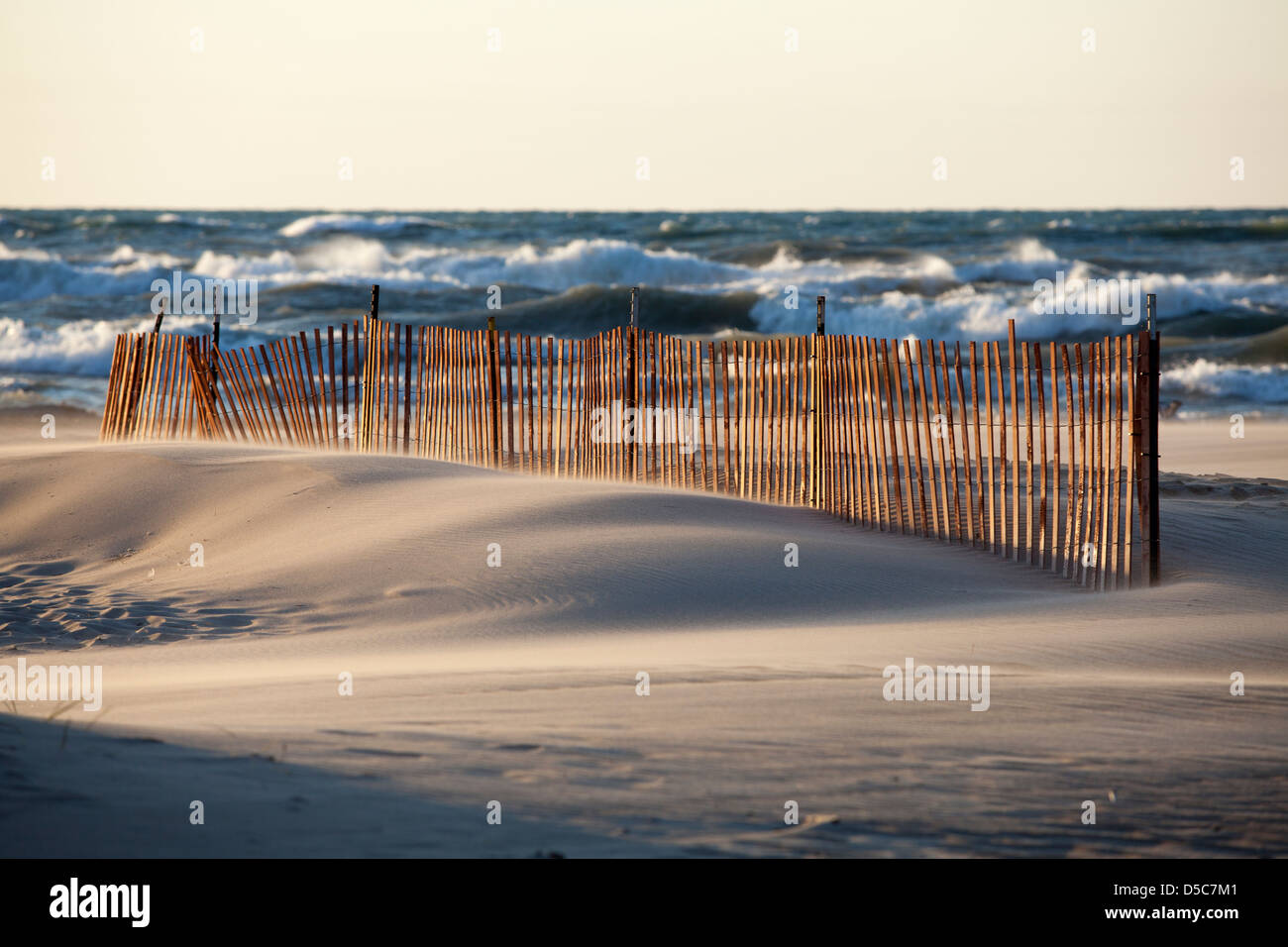 Sand blowing in the wind, sunset at Michigan Lake, New Buffalo Beach ...