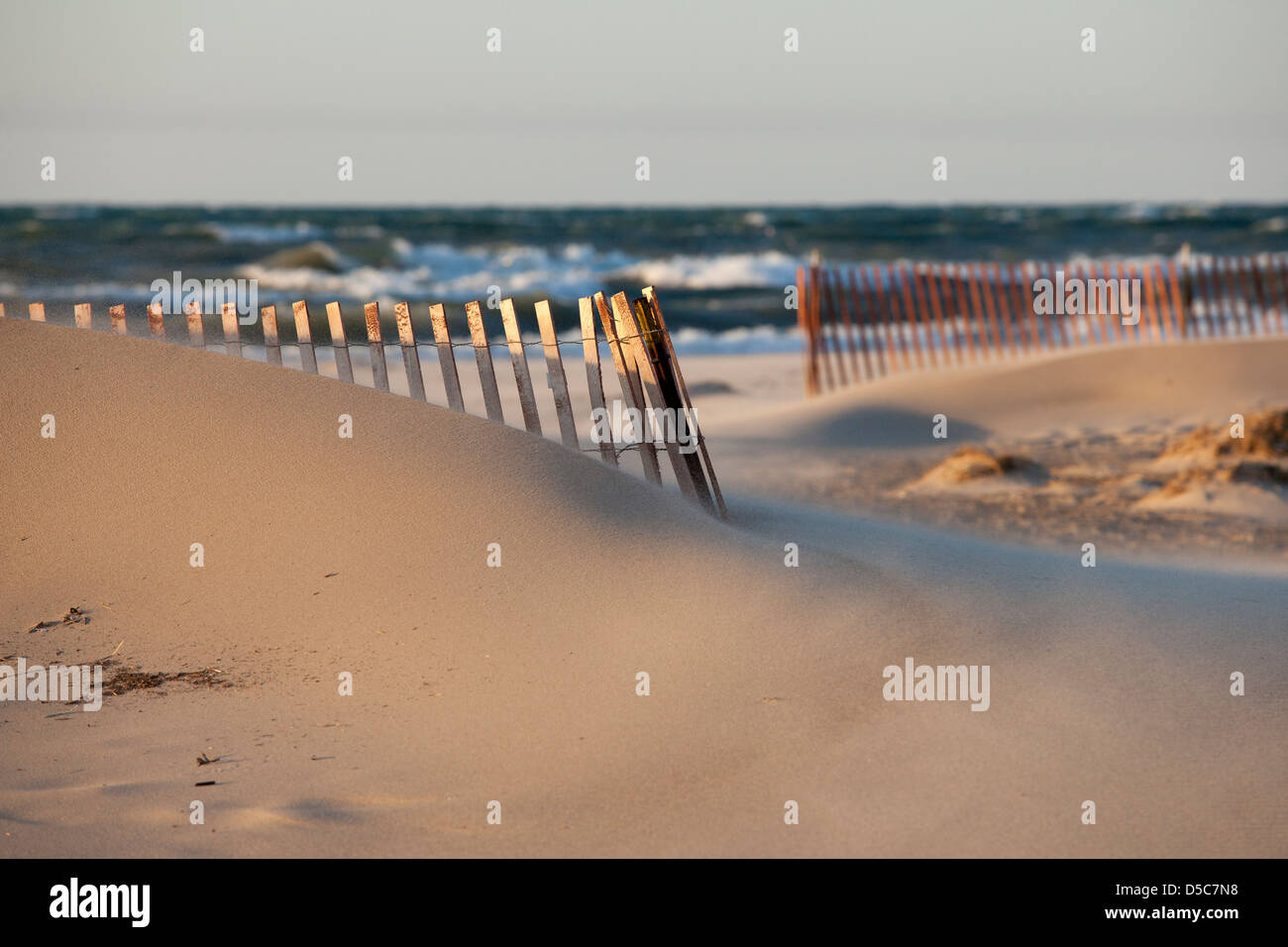Sand blowing in the wind, sunset at Michigan Lake, New Buffalo Beach ...