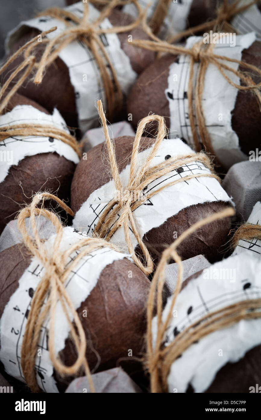 Brown easter eggs with musical notes and ribbon Stock Photo - Alamy