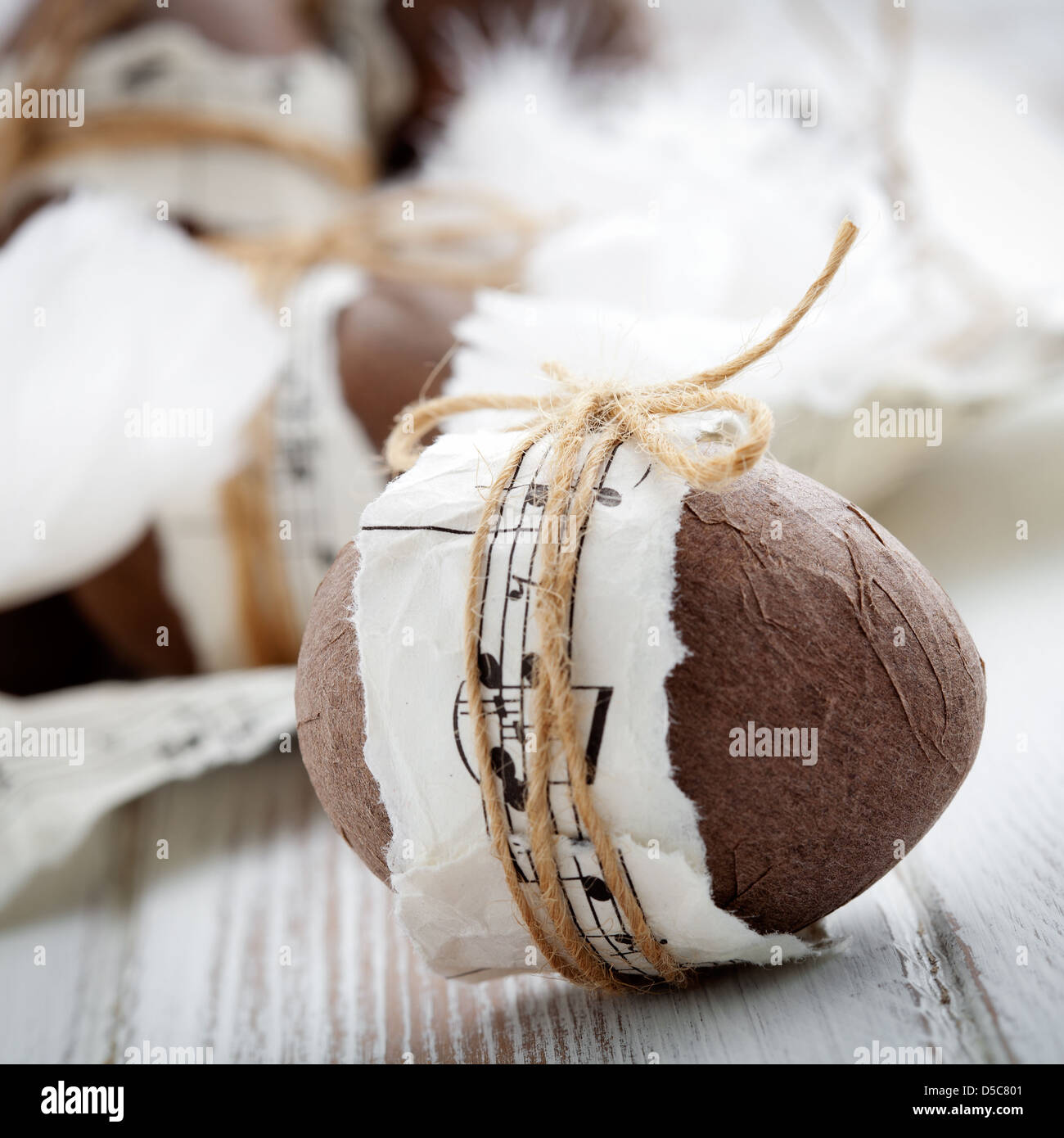 Brown easter eggs with musical notes and ribbon Stock Photo - Alamy