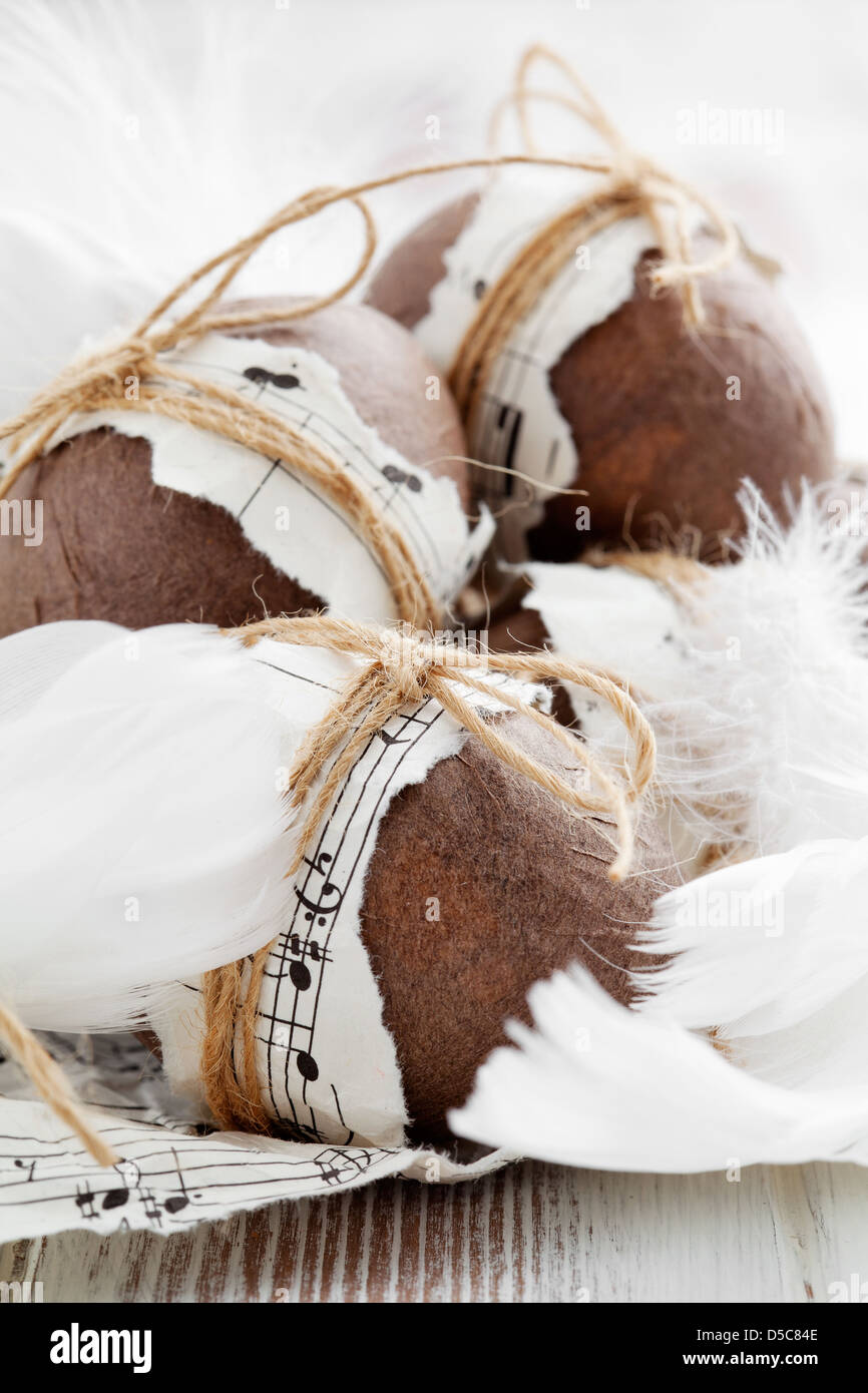 Brown easter eggs with musical notes and ribbon Stock Photo - Alamy