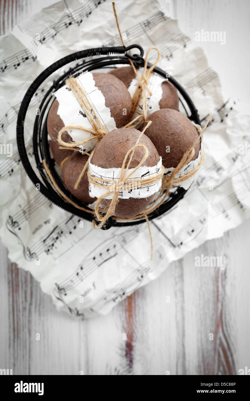Brown easter eggs with musical notes and ribbon Stock Photo - Alamy