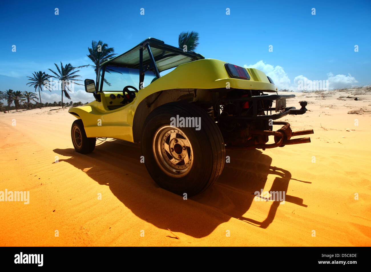 desert buggy in desert sand under blue sky Stock Photo - Alamy