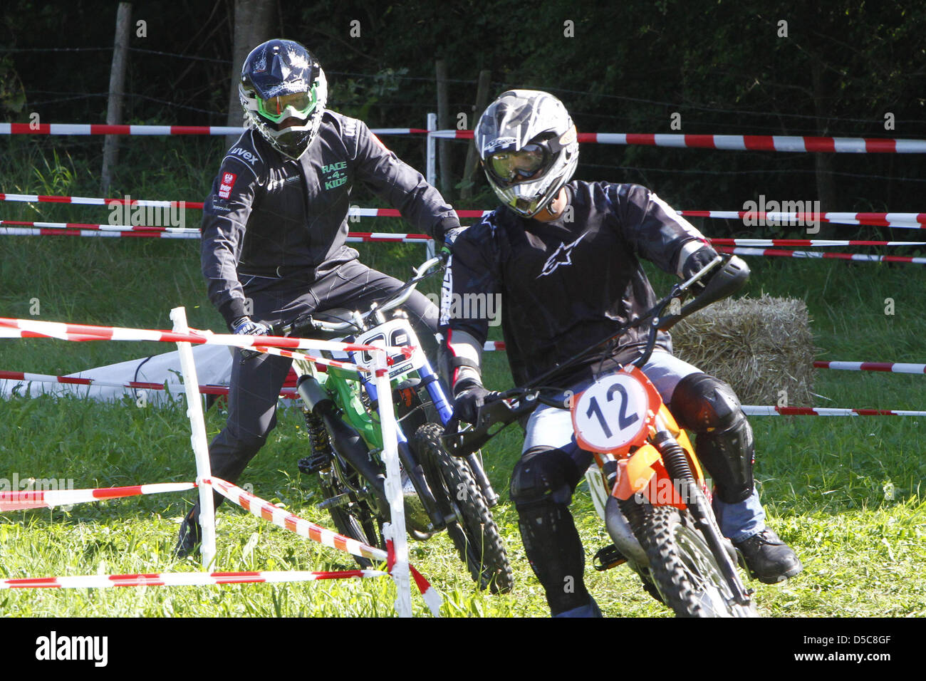 Former Tour de France winner Jan Ullrich taking part in a mofa race ...