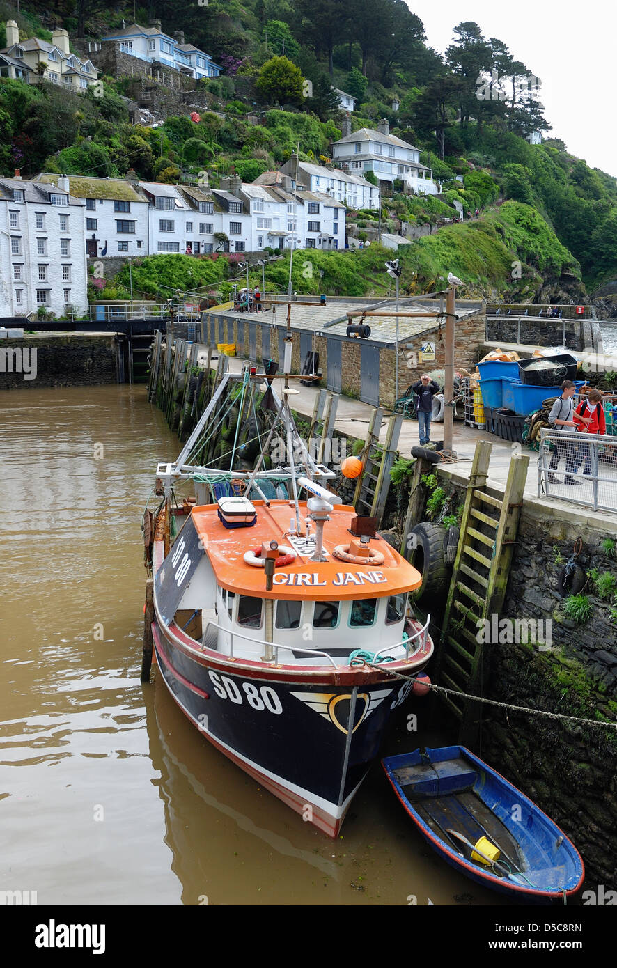 A fishing boat in Polperro harbour Cornwall england uk Stock Photo - Alamy