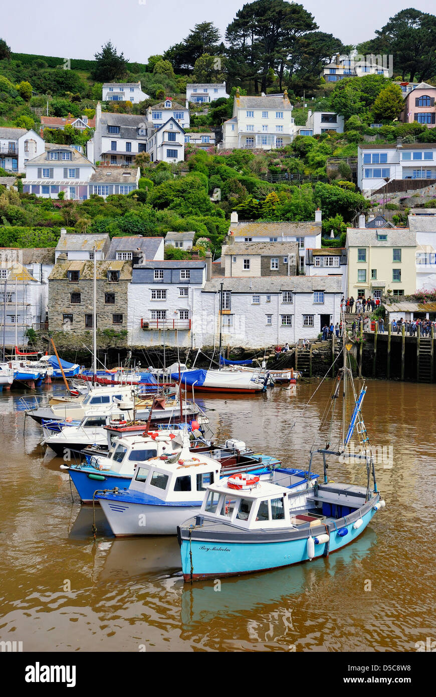 Fishing boats in Polperro harbour Cornwall england uk Stock Photo - Alamy