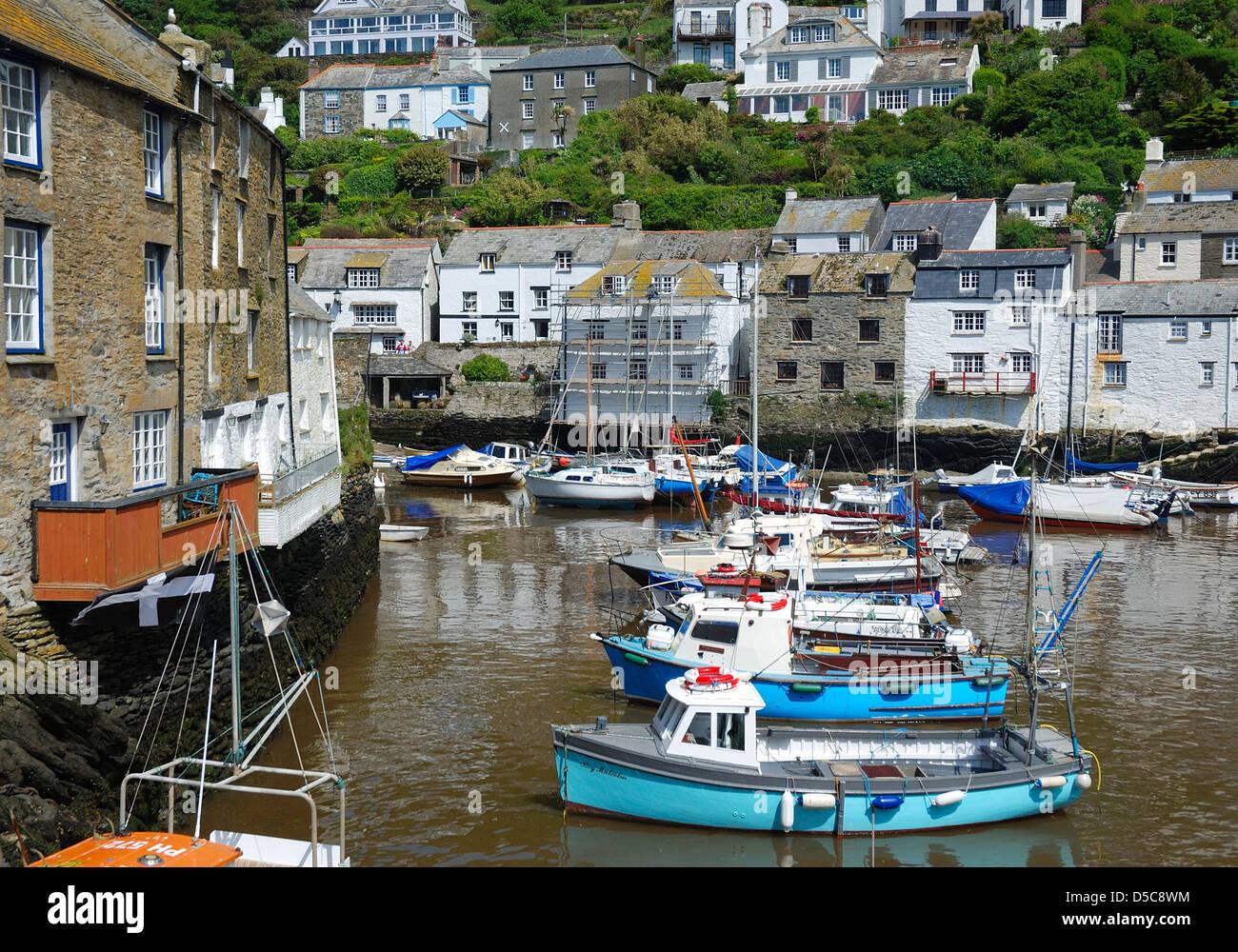 Fishing boats in Polperro harbour Cornwall england uk Stock Photo - Alamy