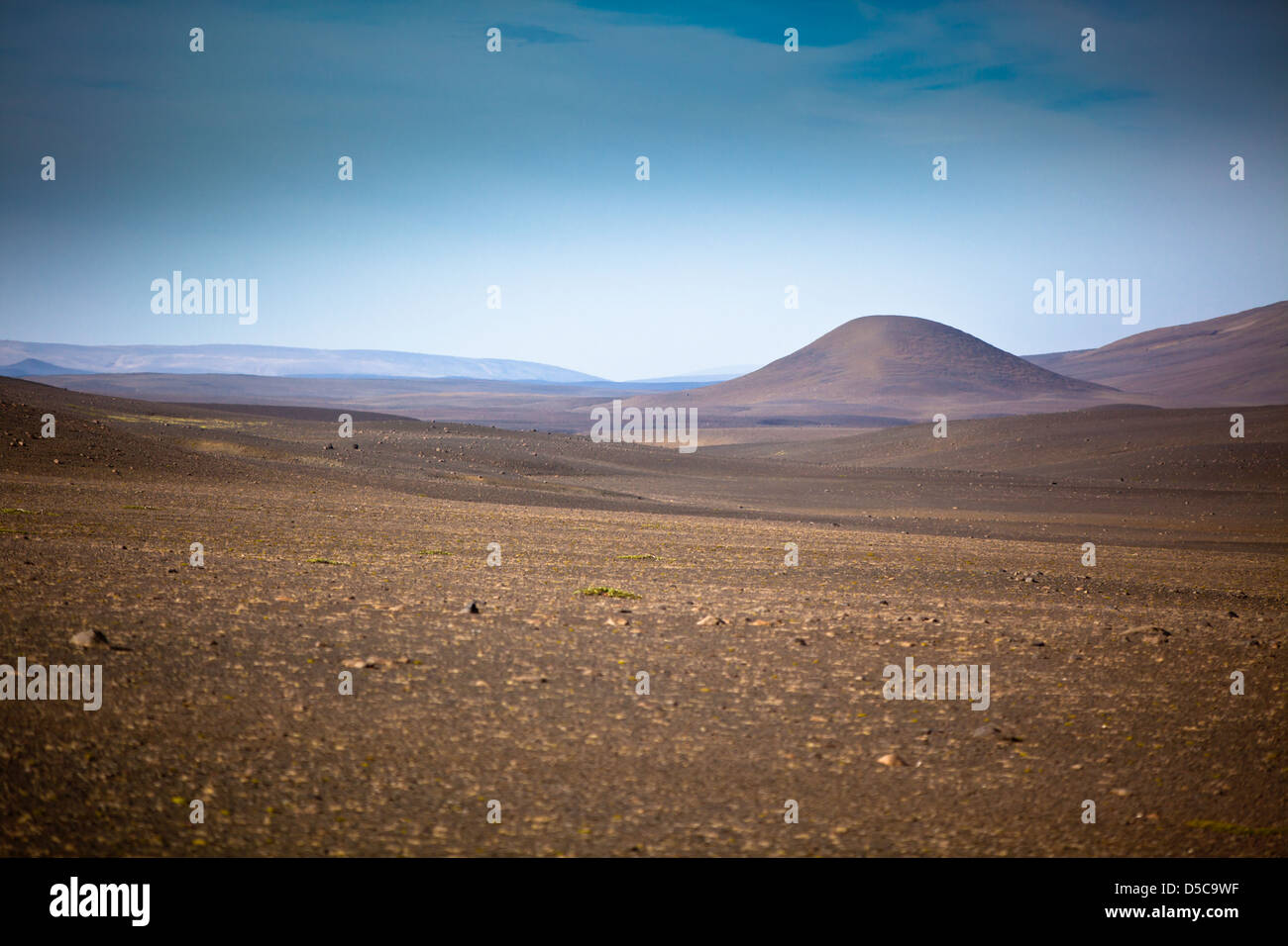 Dry Gravel field landscape under a blue summer sky. Highlands of ...