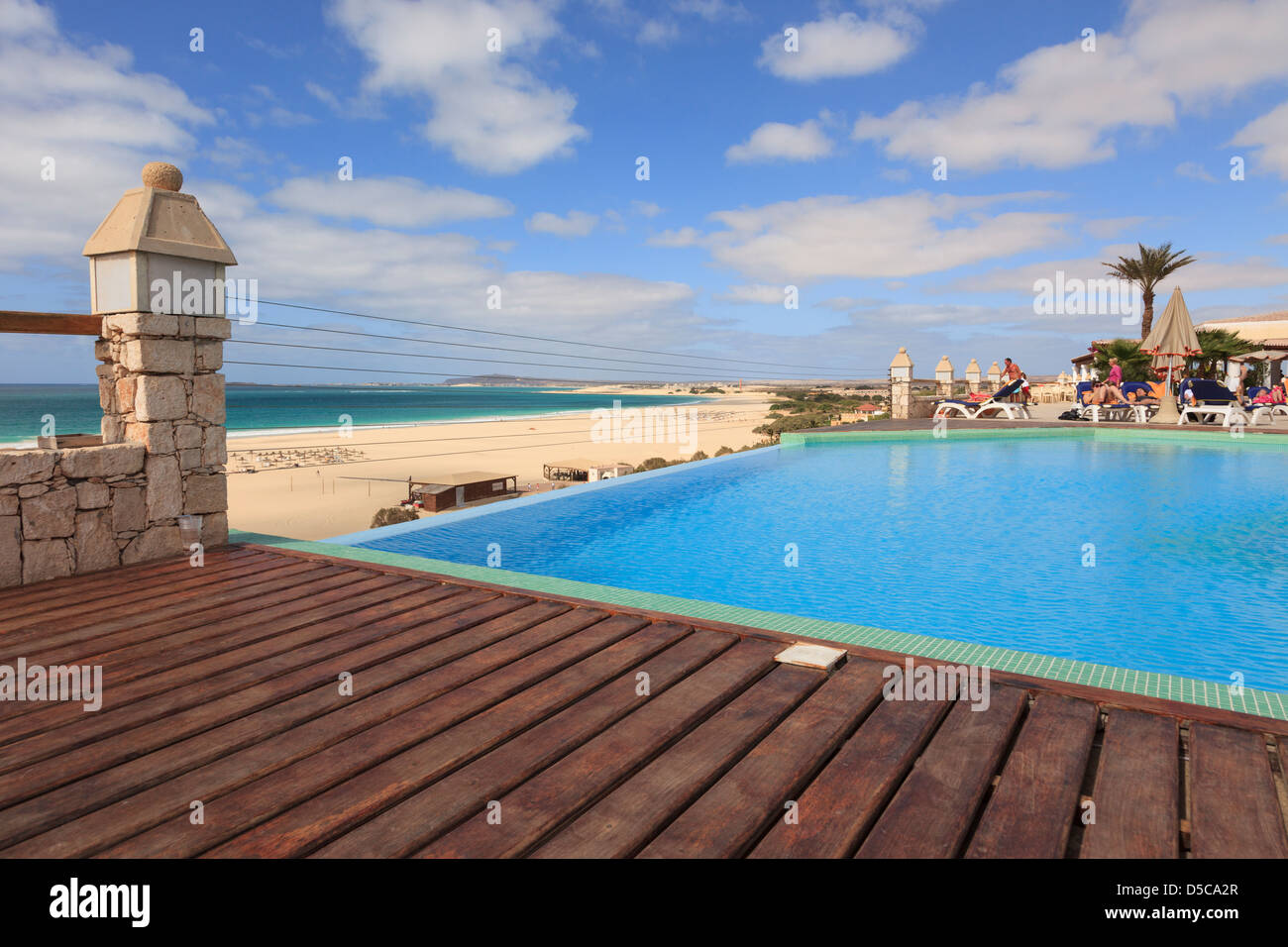 Wooden sun decking by infinity pool in Iberostar resort hotel above ...