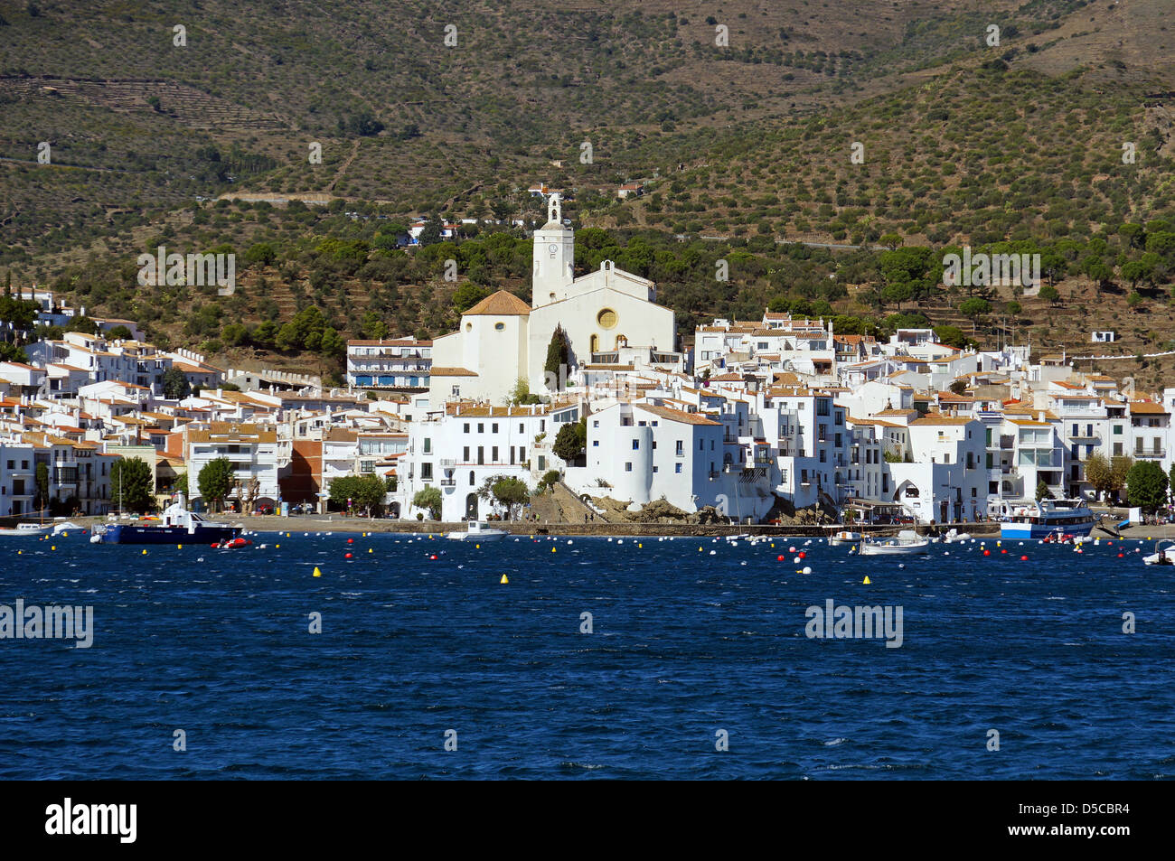 Typical coastal Mediterranean village of Cadaques with the sea in ...