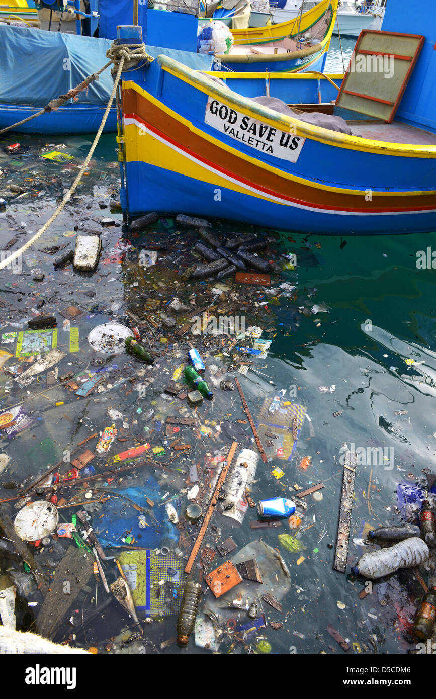 Pollution in harbour at Marsaxlokk, Malta Stock Photo - Alamy