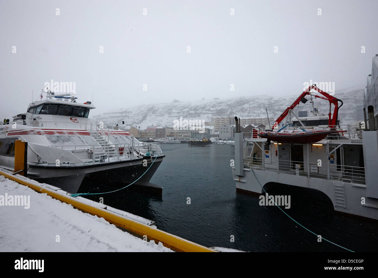 modern fast catamaran ferries tied up in bad weather hammerfest harbour ...