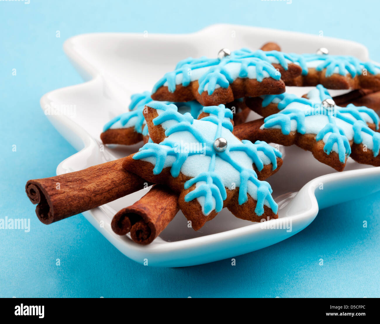 Gingerbread cookies decorated with light blue and white Stock Photo - Alamy