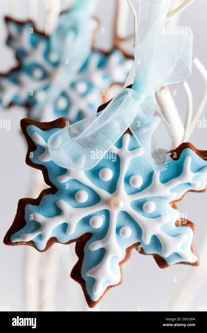 Gingerbread cookies decorated with light blue and white Stock Photo - Alamy
