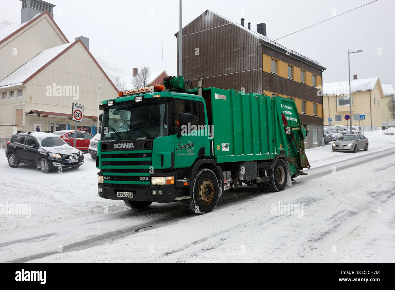 waste recycling lorry driving through town hammerfest finnmark norway ...