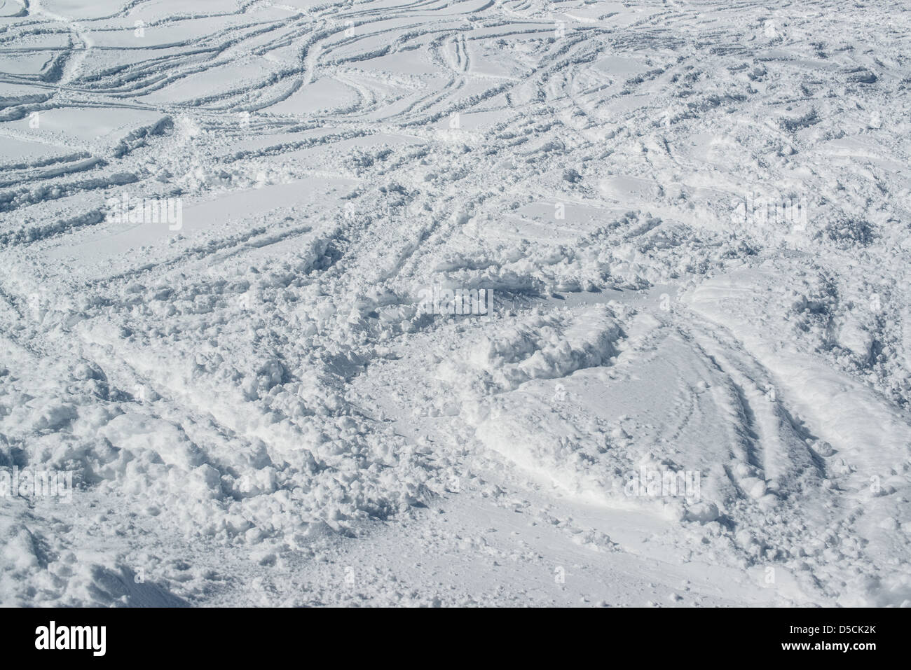 Ski tracks in the powder snow - skiing background Stock Photo - Alamy