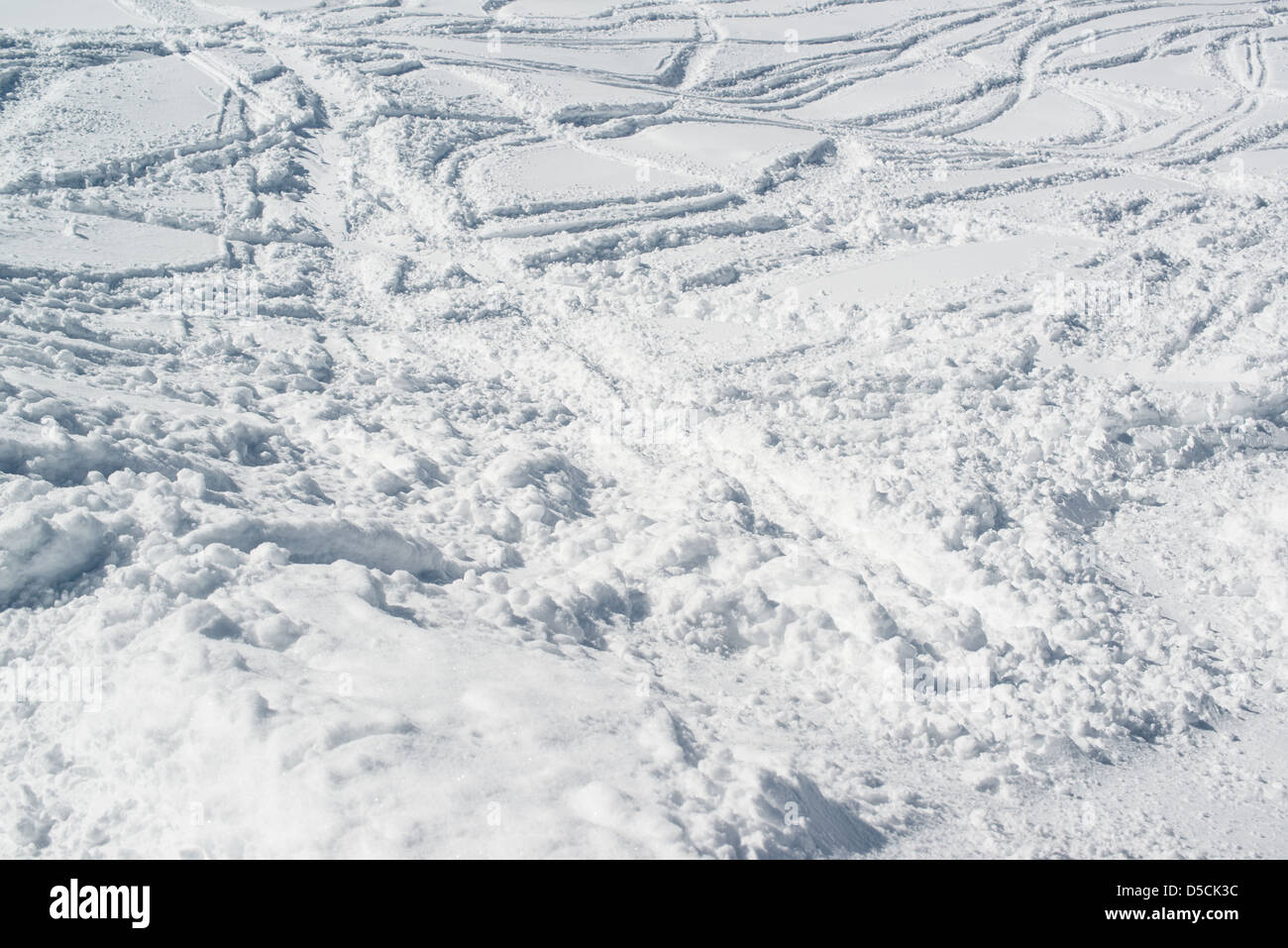 Ski tracks in fresh powder snow - skiing background Stock Photo - Alamy