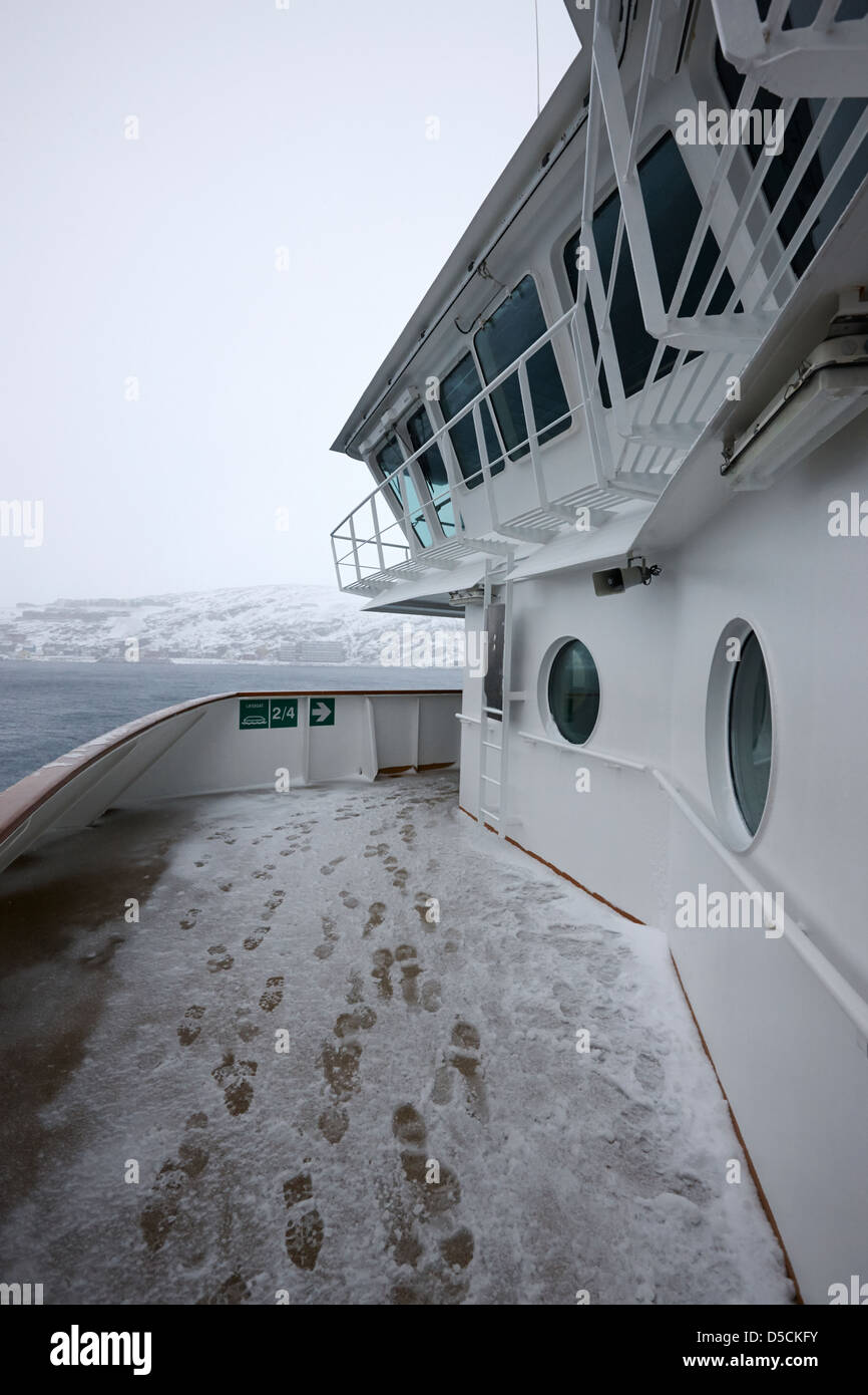bridge and snow covered walkway on board hurtigruten ferry passenger ...