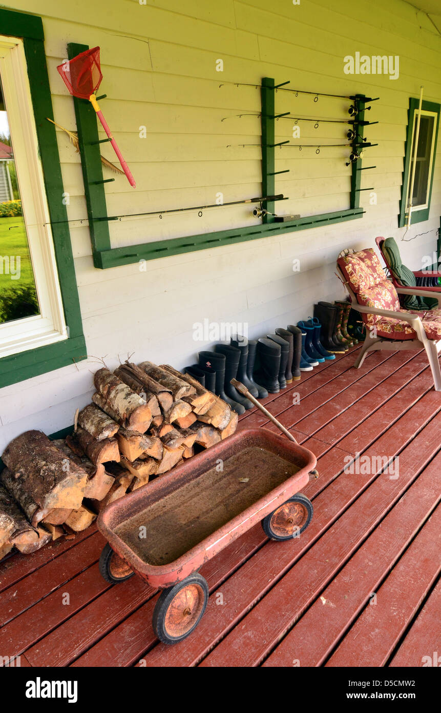 Wagon and firewood on the porch of the Gustavus Inn, Gustavus, Alaska ...