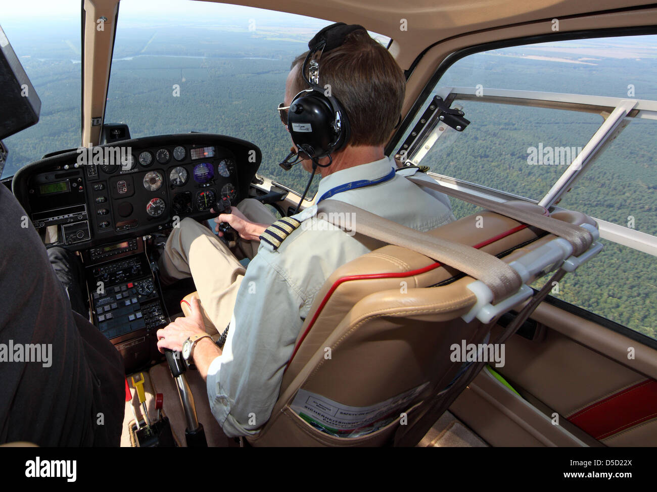 Strausberg, Germany, helicopter pilot during a flight in the cockpit ...