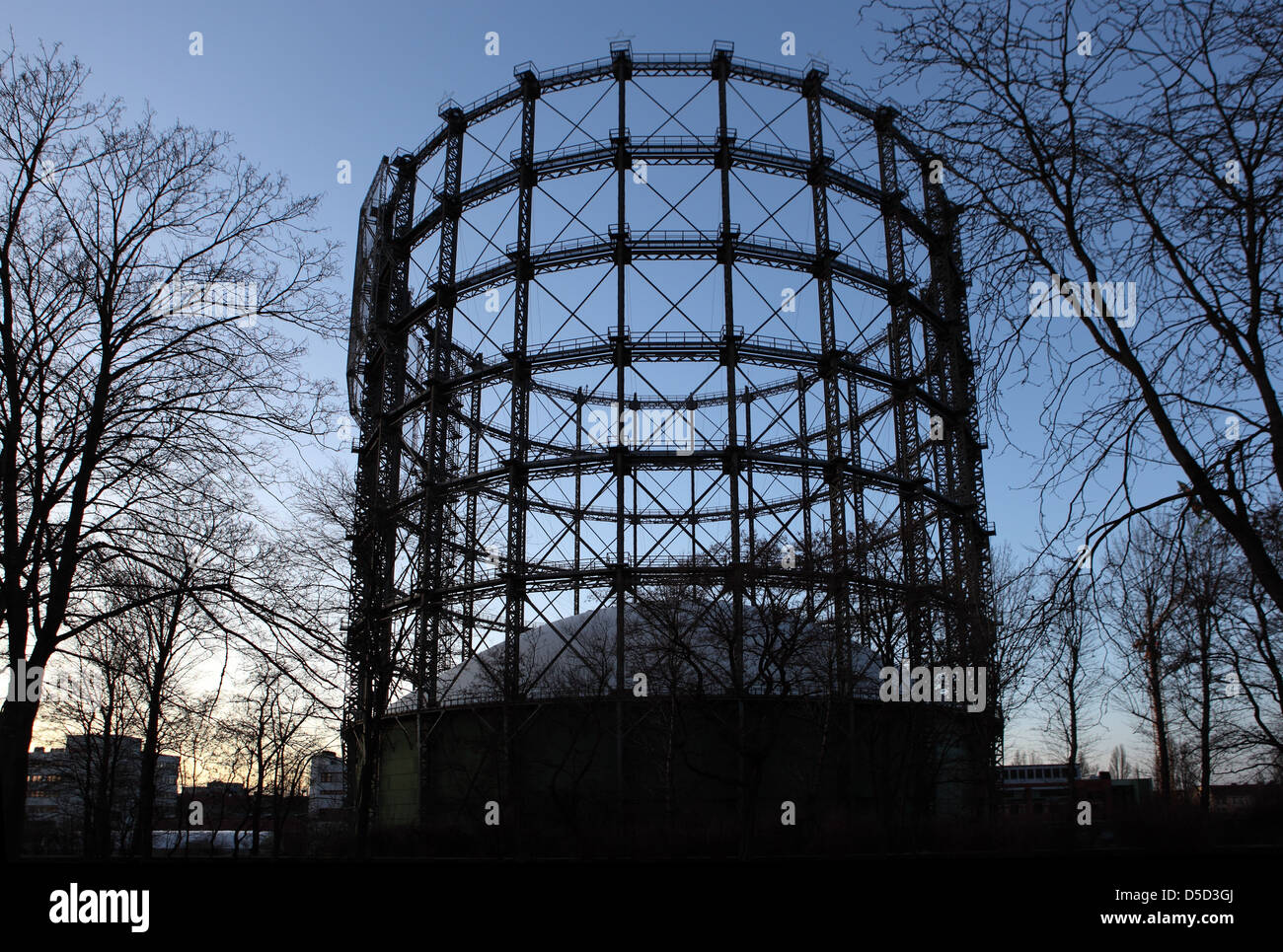 Berlin, Germany, the silhouette of the Gasometer Schoeneberg at dusk ...