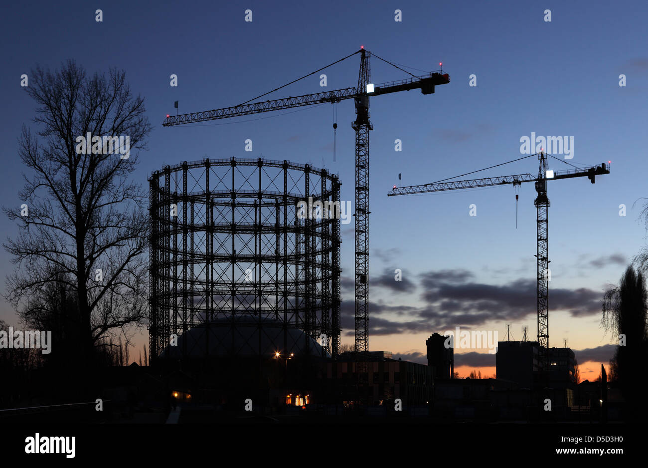 Berlin, Germany, Silhouette, Construction cranes at the Gasometer ...