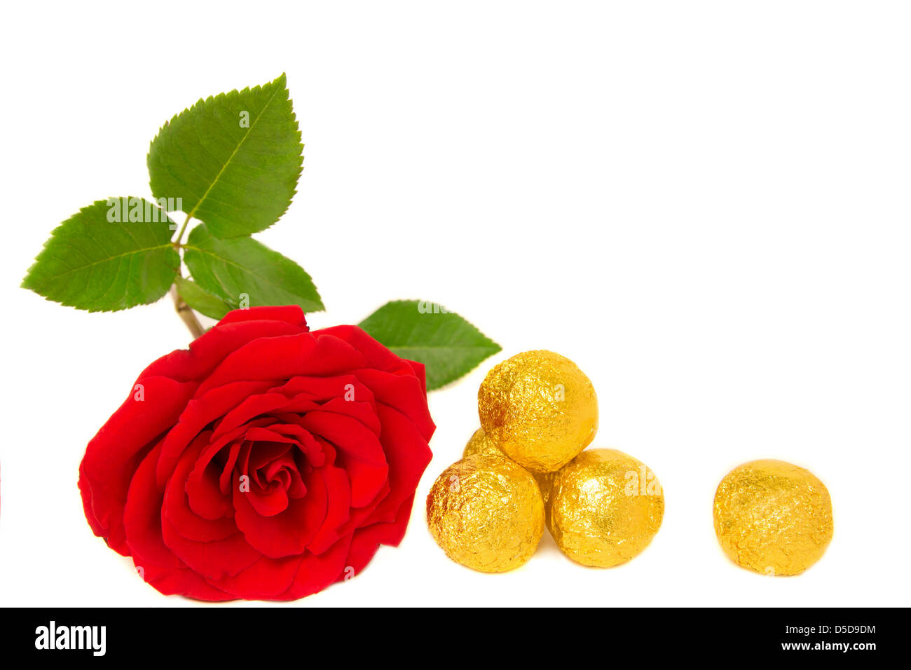 Red rose and chocolate candies isolated on white background Stock Photo ...