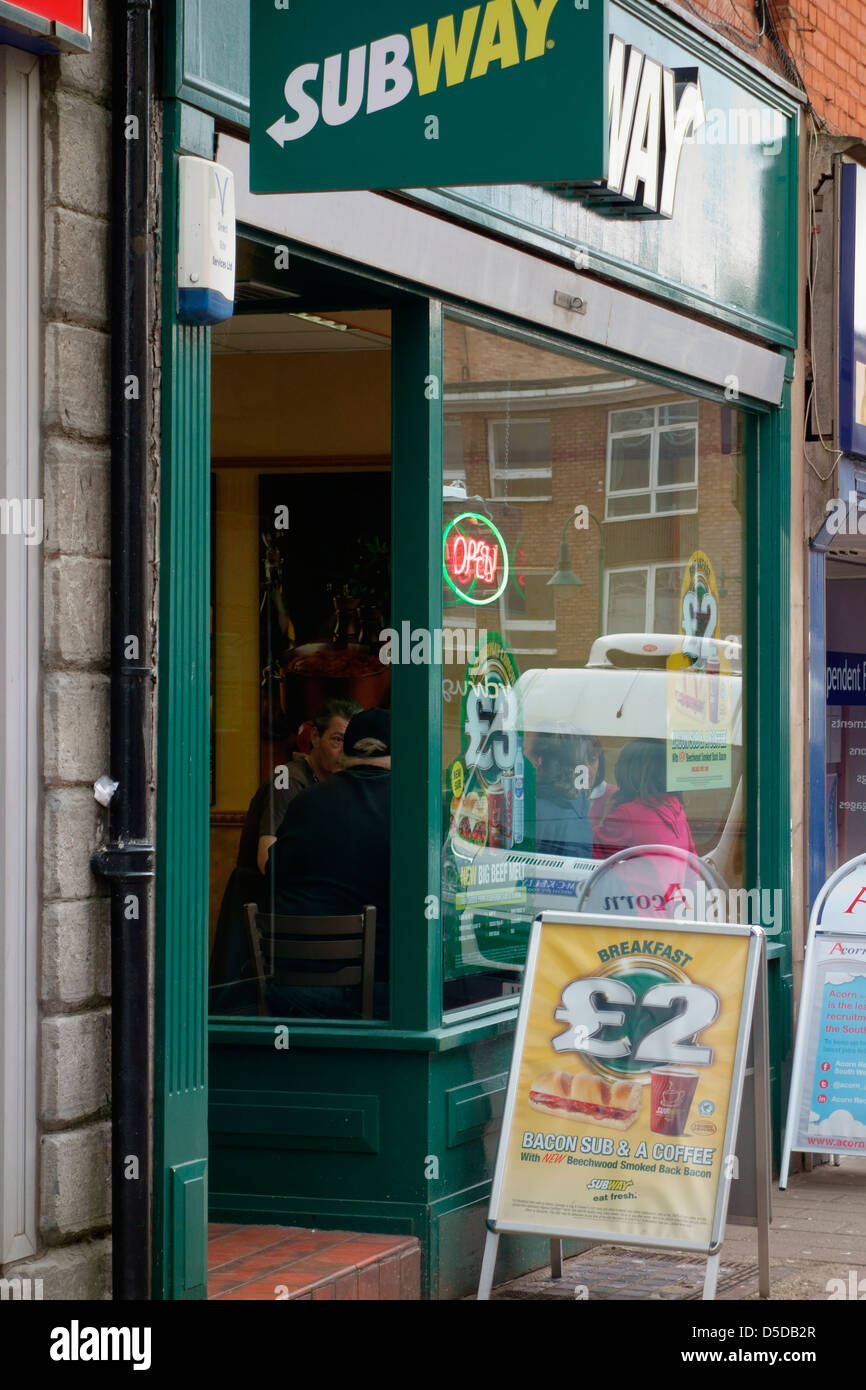 Subway fast food outlet with street pavement signs Stock Photo - Alamy