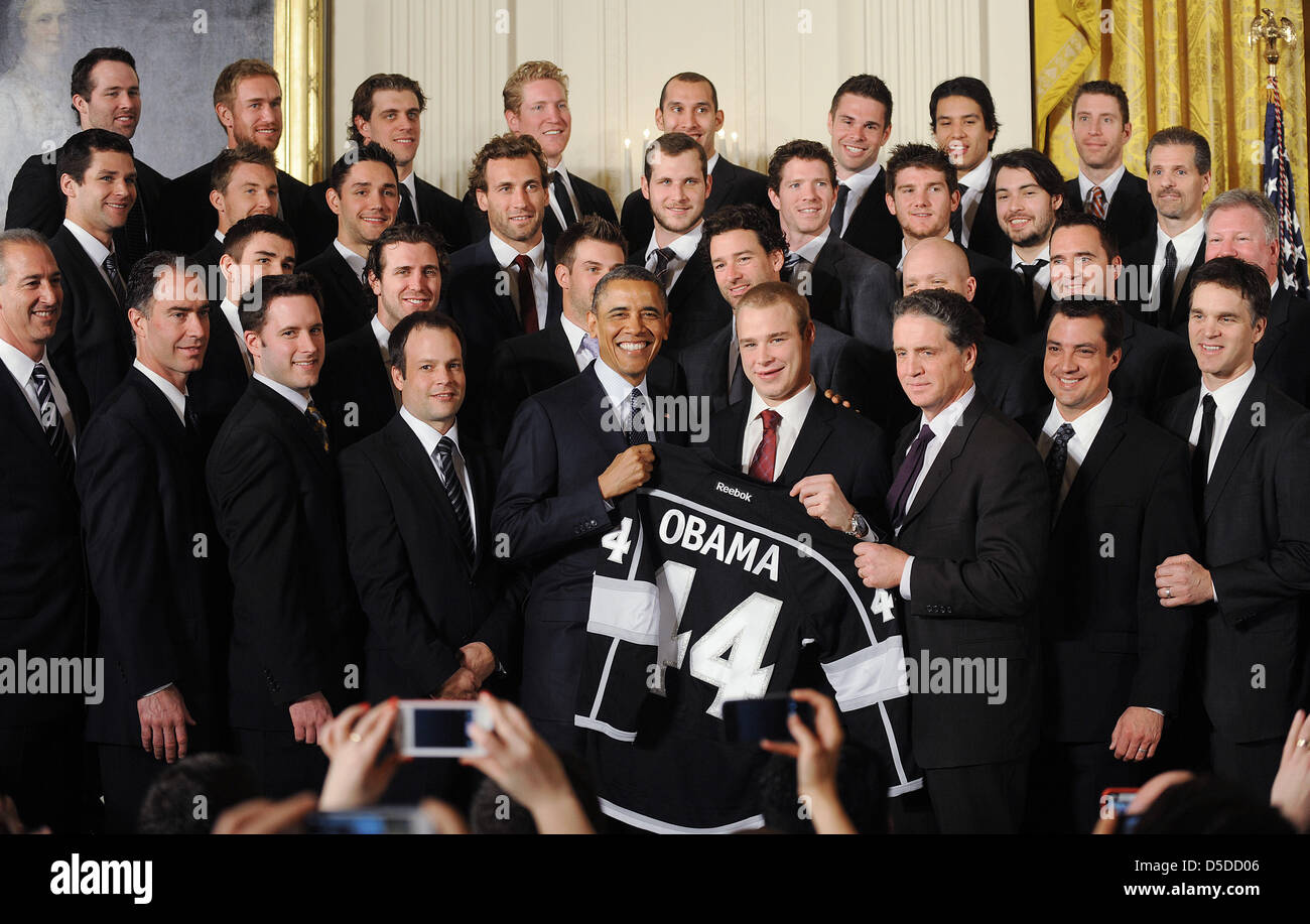 United States President Barack Obama poses with the Stanley Cup ...