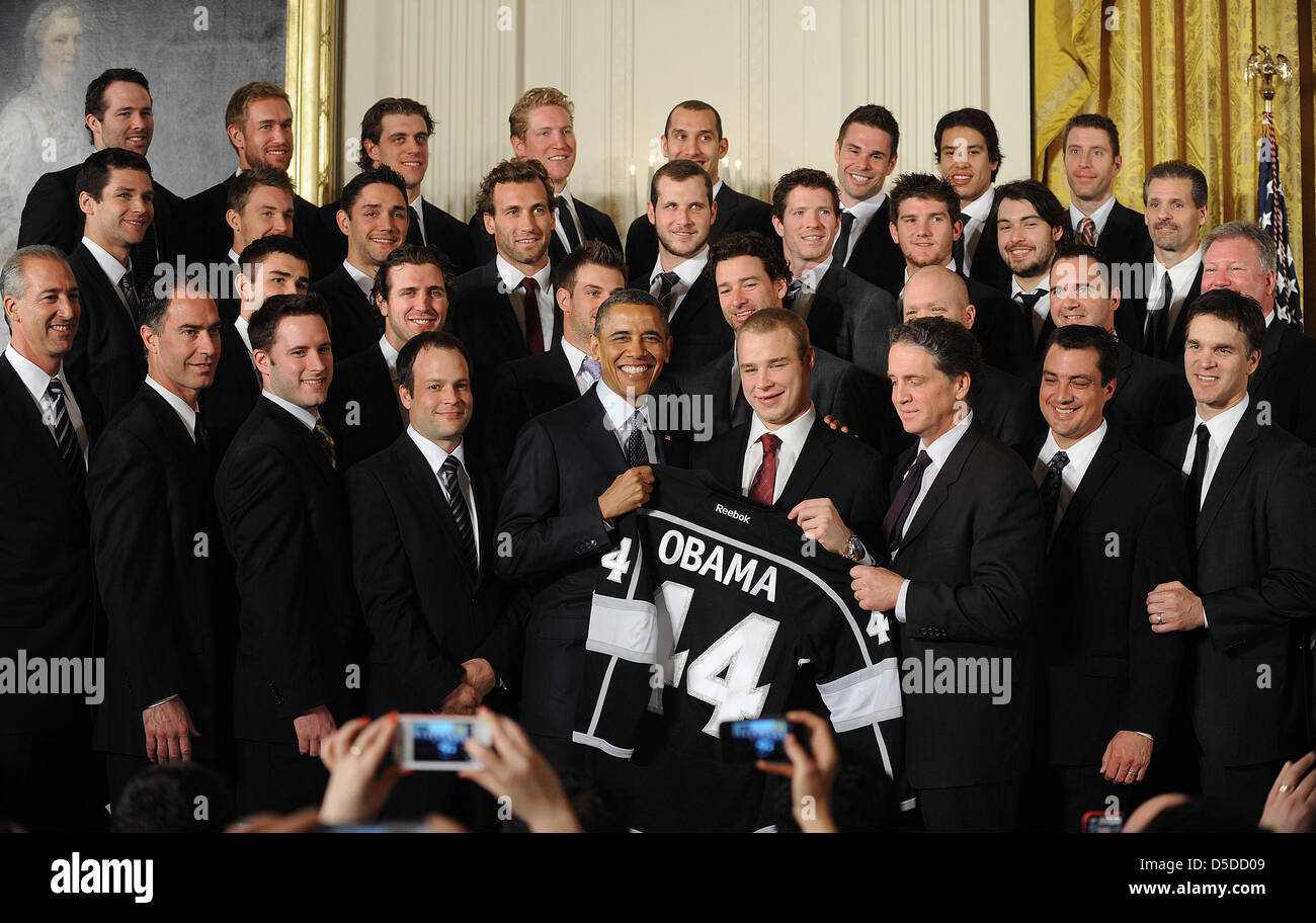United States President Barack Obama poses with the Stanley Cup ...