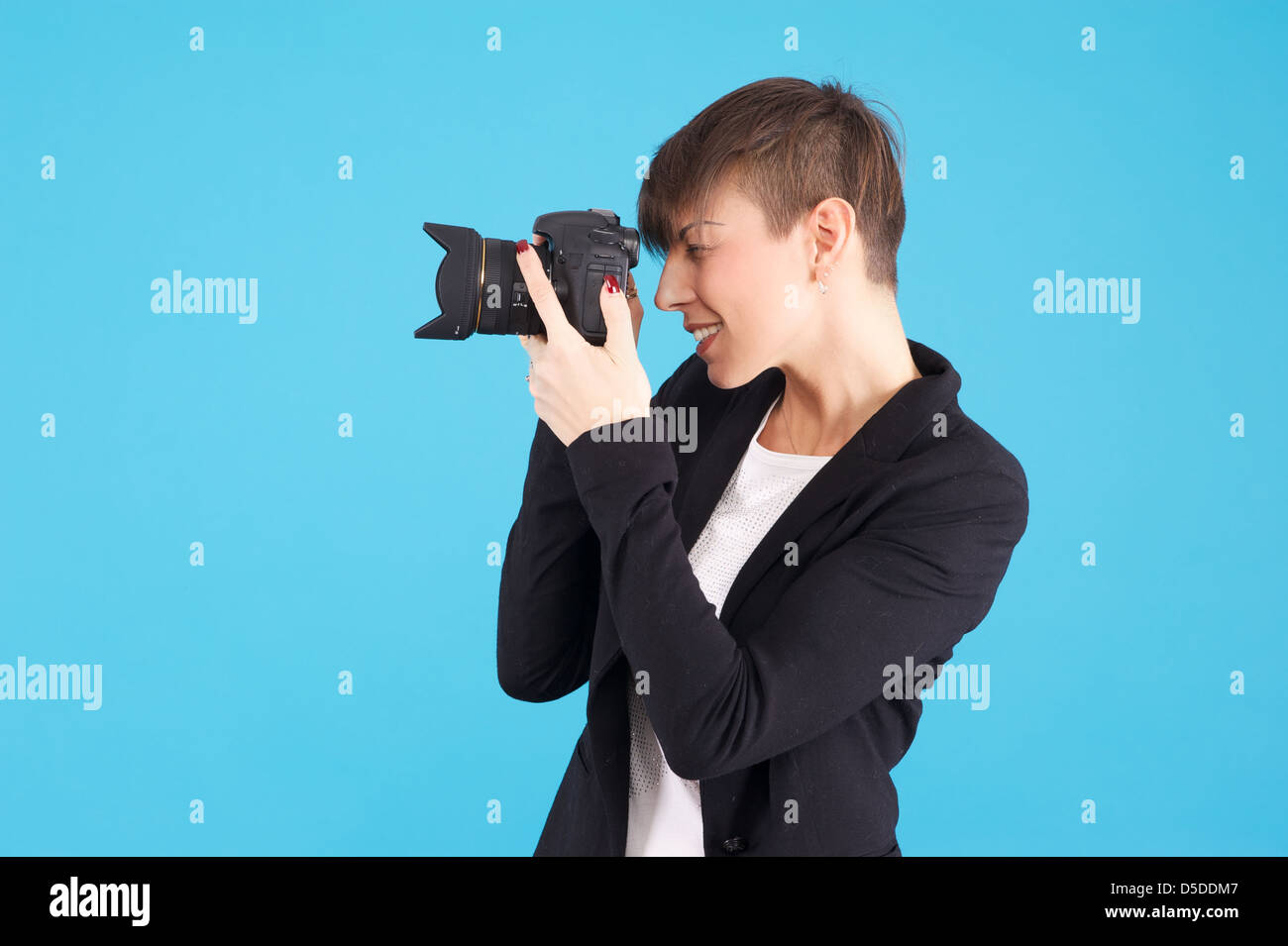 Woman photographer blue hi-res stock photography and images - Alamy